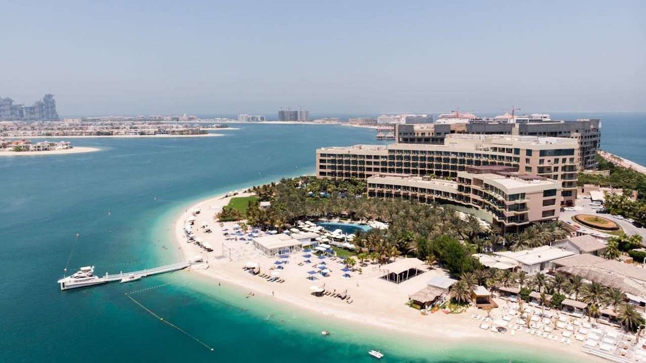 By what sea is Dubai located and what is the water temperature there? | Two Continents | Two ...